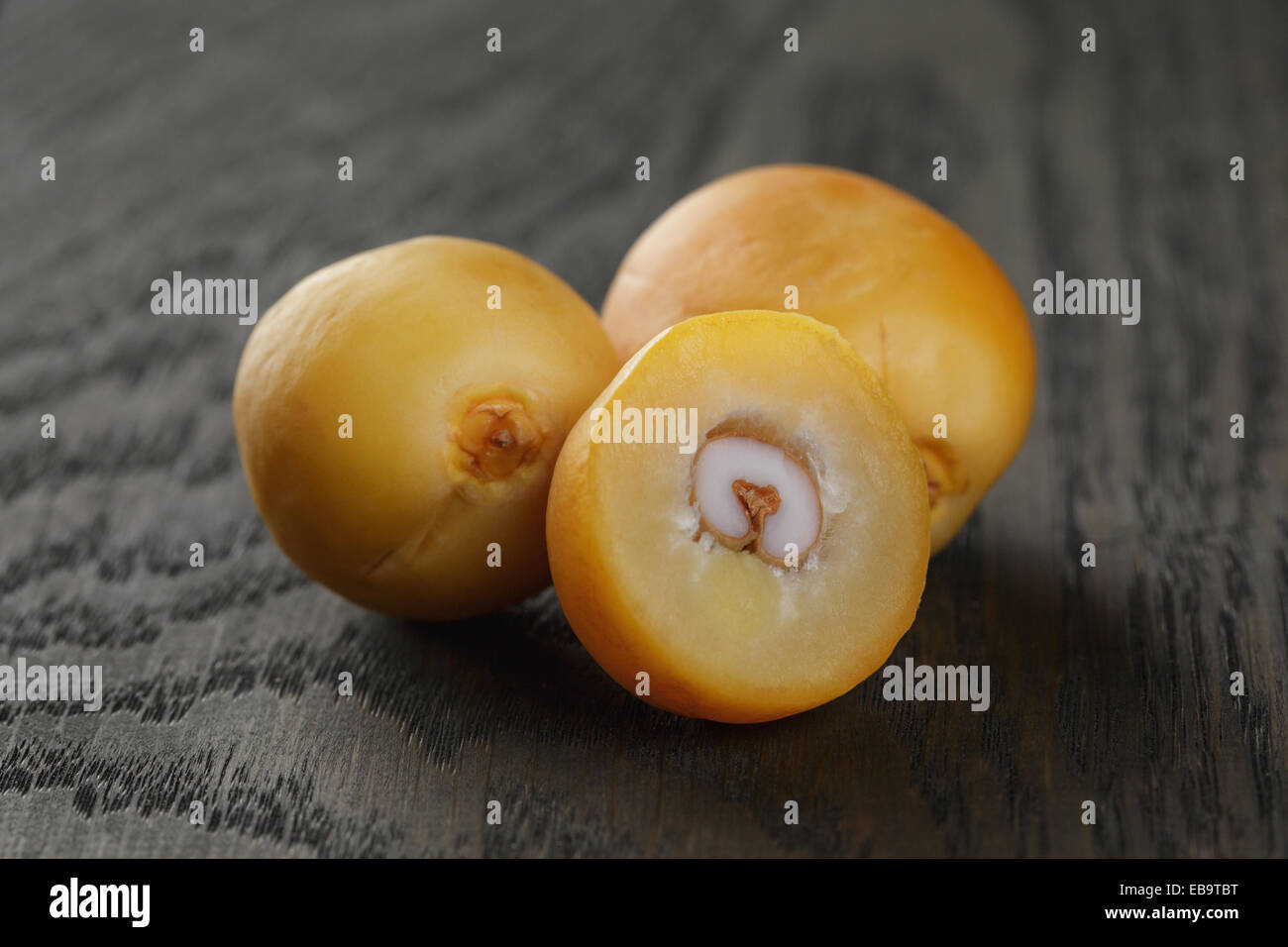 fresh raw dates on table, old oak wood Stock Photo - Alamy