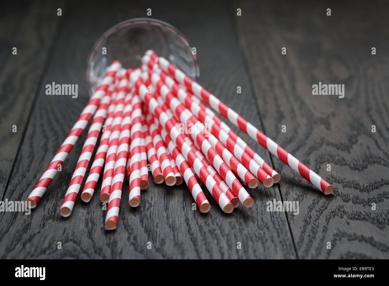 vintage paper straws in glass on wood table, rustic style Stock Photo ...