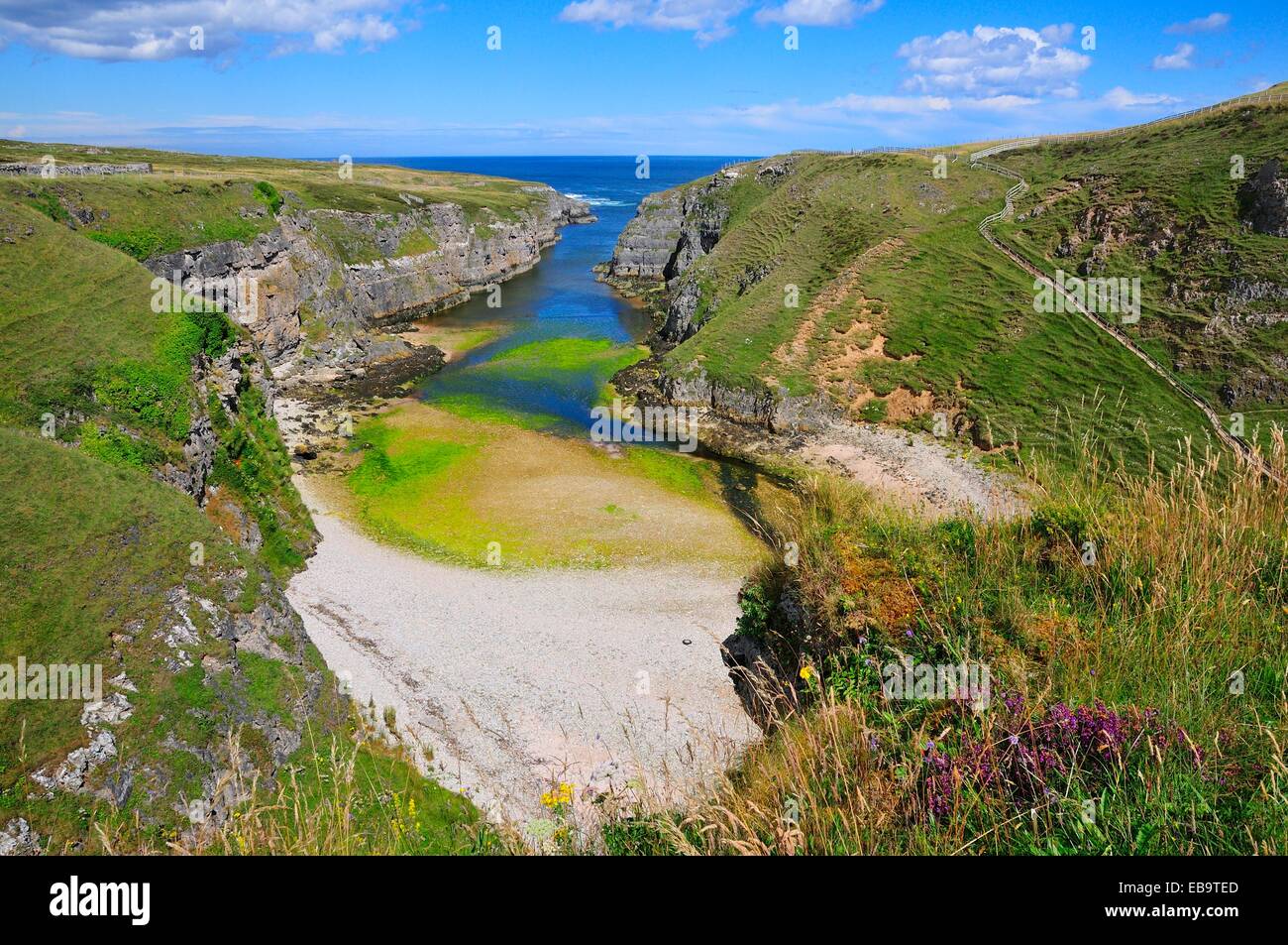 Sea inlet with a trail to a viewpoint at Smoo Cave, Durness, Caithness ...