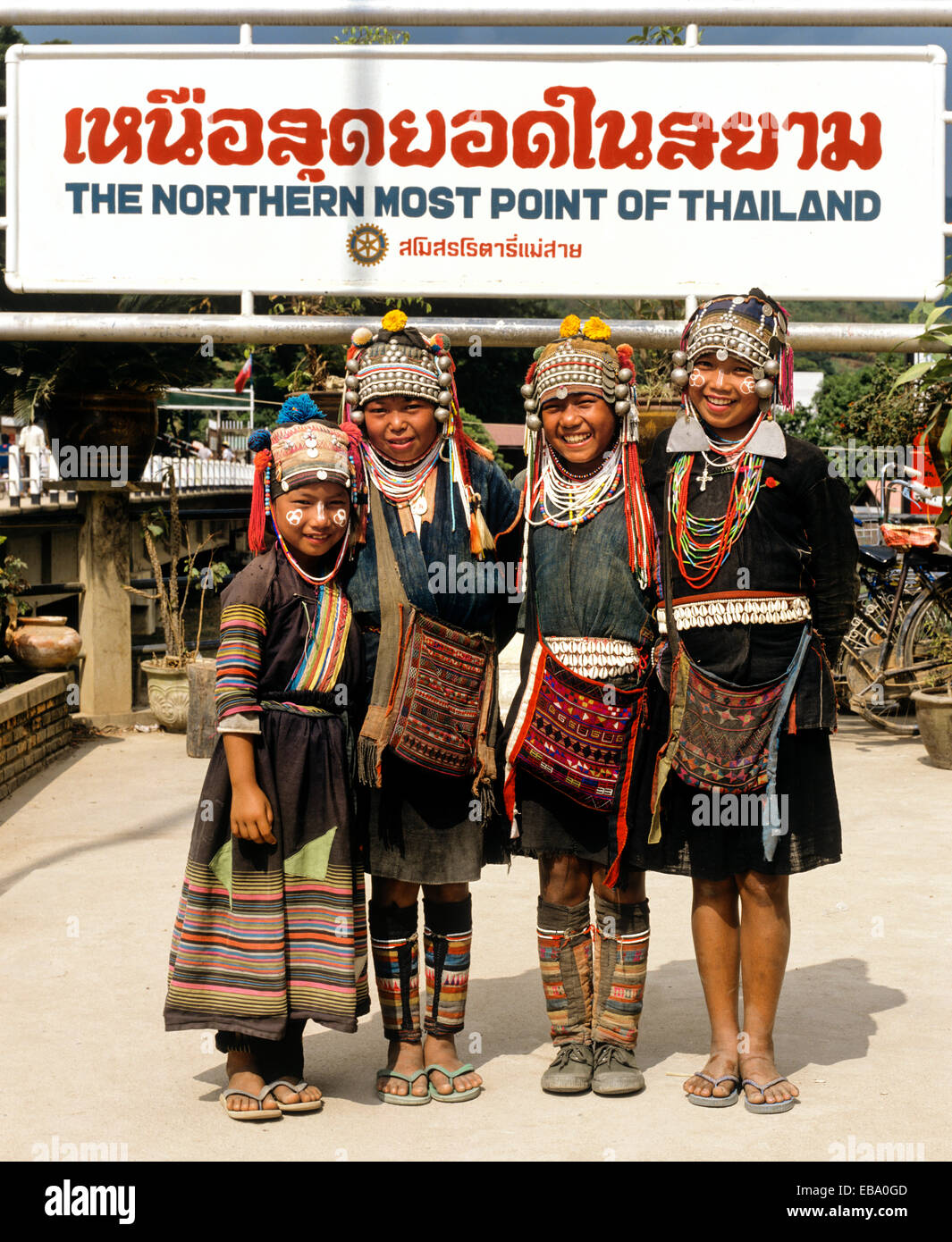 Akha hill tribe girls wearing traditional costumes and headdresses ...