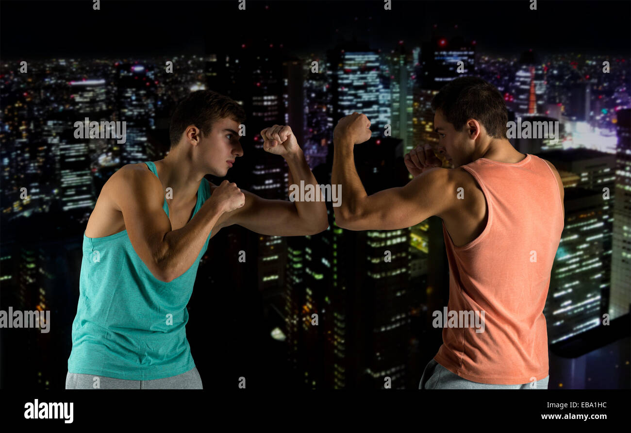 young men fighting hand-to-hand Stock Photo - Alamy