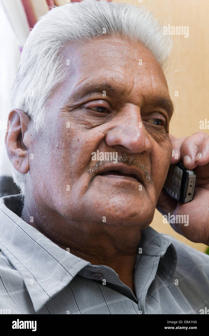 Older man chatting on the telephone Stock Photo - Alamy