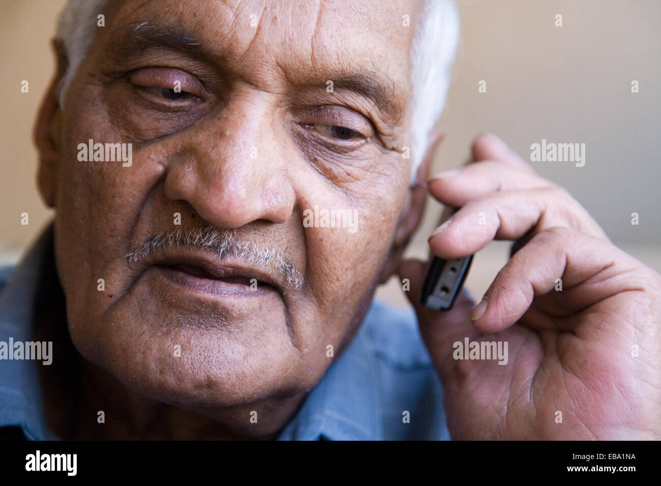 Older man chatting on the telephone Stock Photo - Alamy