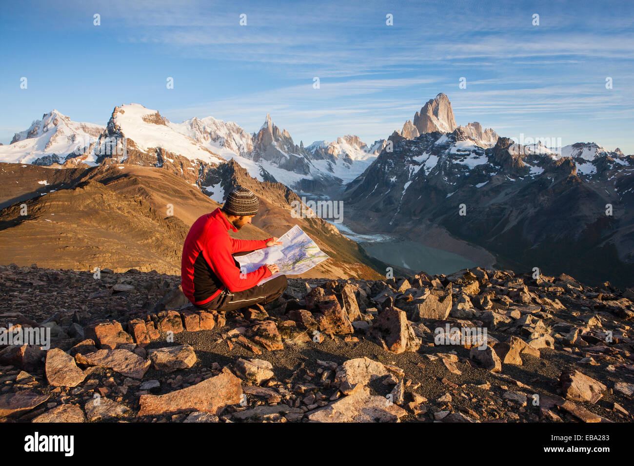 Hiker at the Loma del Pliegue Tumbado, views of Cerro Torre and the ...