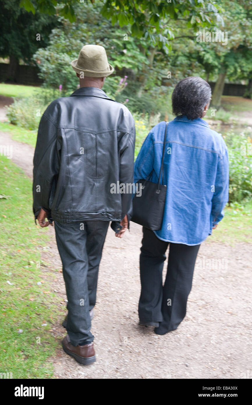 Older couple walking in the park together Stock Photo - Alamy