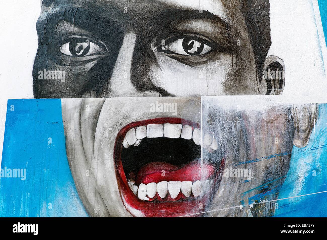 Graffiti of a double image of a man face in East London, London ...