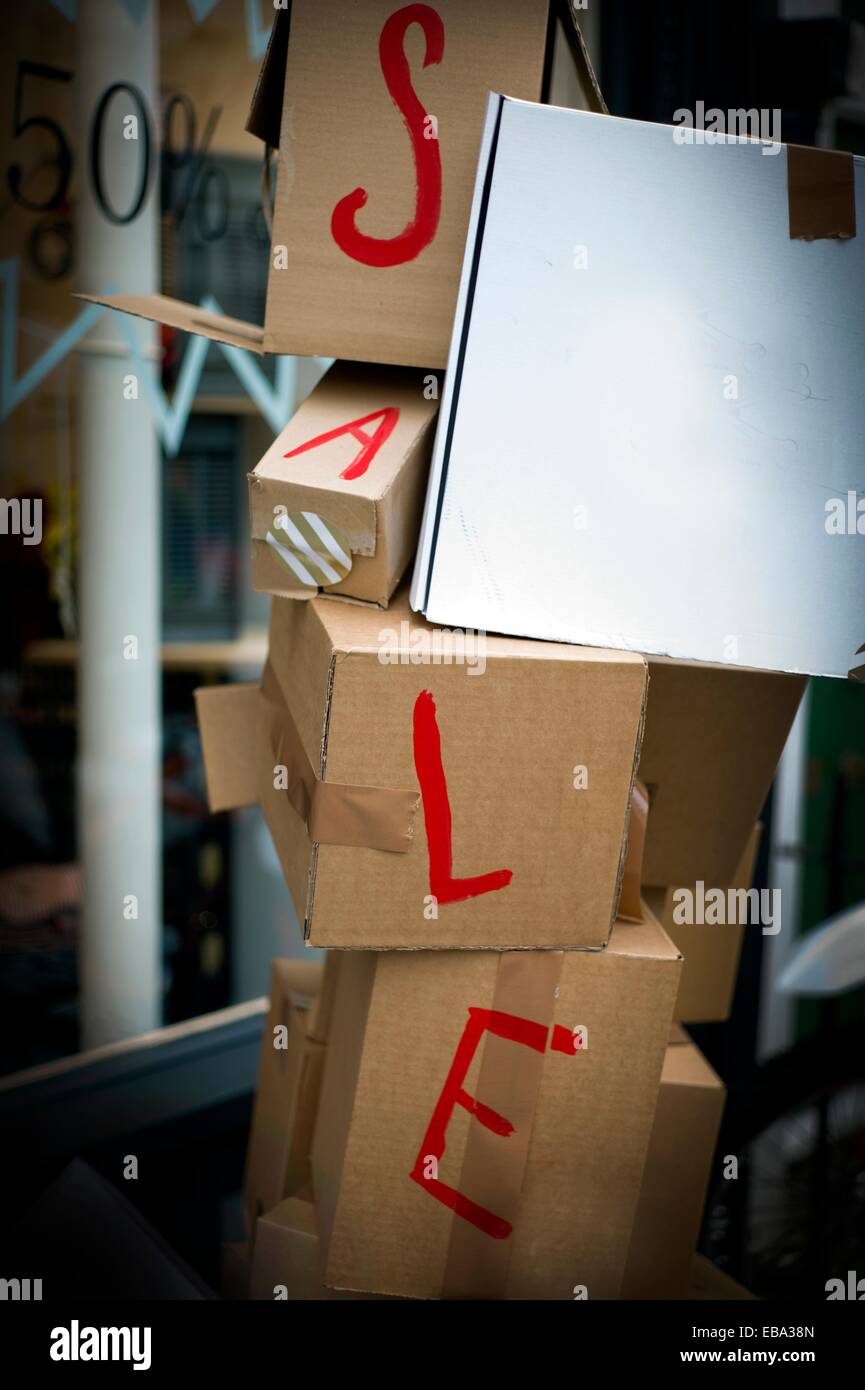 lot of boxes announcing sales, London, England, UK Stock Photo - Alamy