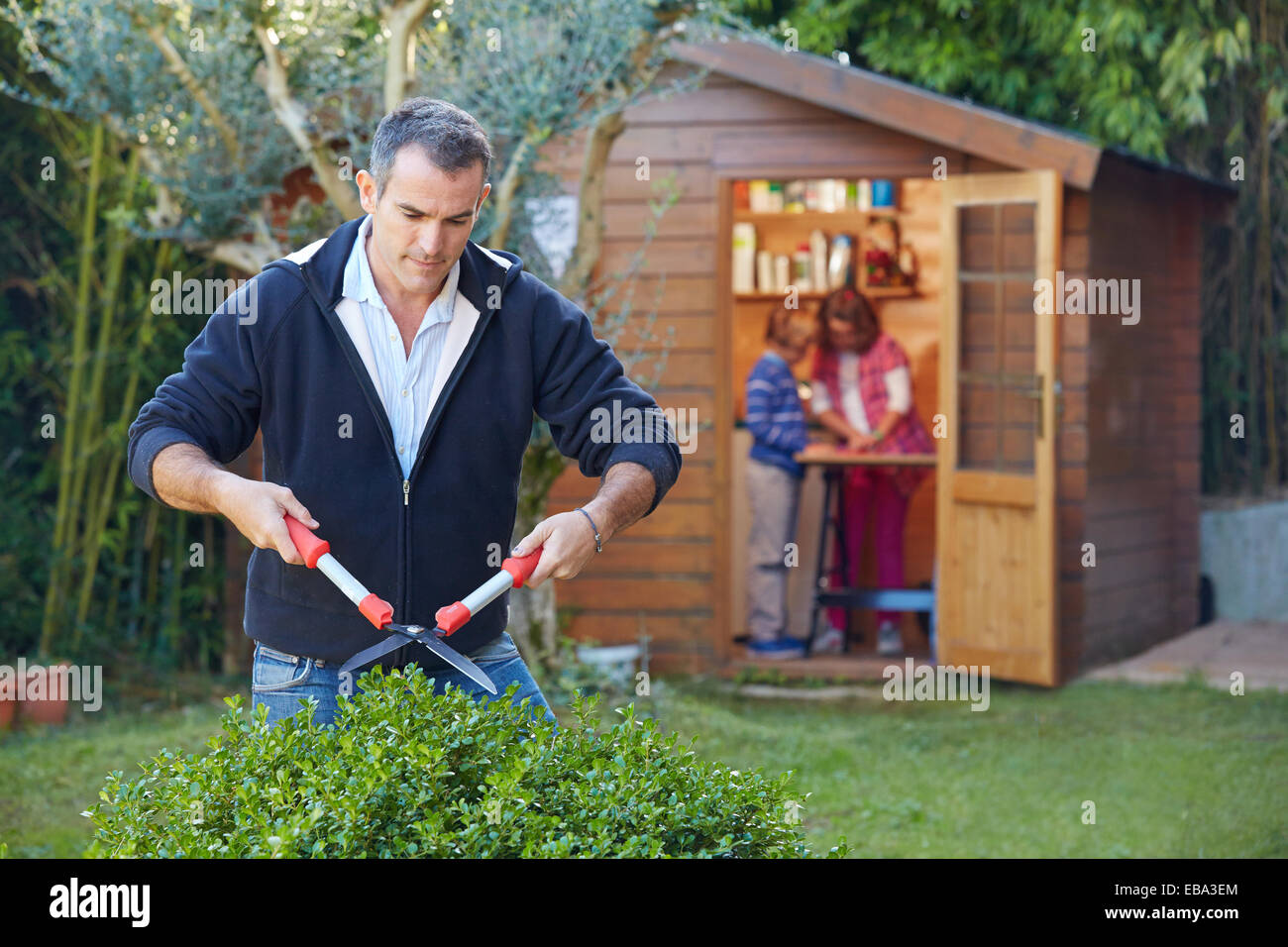 Pruning plant kid hi-res stock photography and images - Alamy