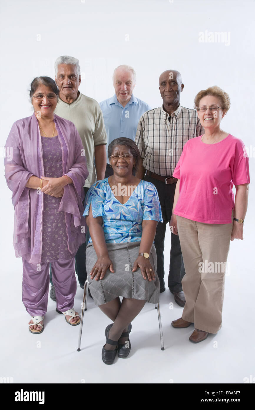 Multiracial group of older people smiling Stock Photo - Alamy