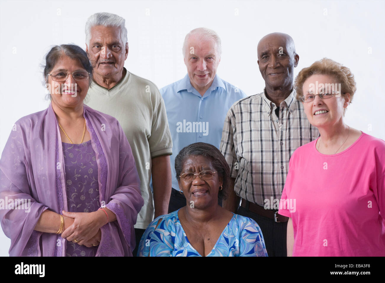Multiracial group of older people smiling Stock Photo - Alamy