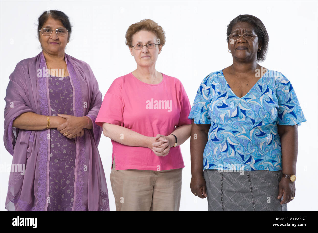 Multiracial group of older women smiling Stock Photo - Alamy