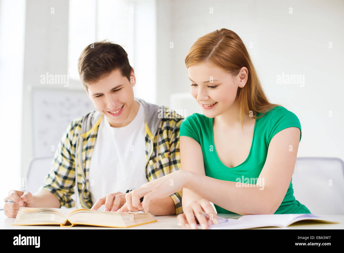Boy taking book classroom hi-res stock photography and images - Alamy