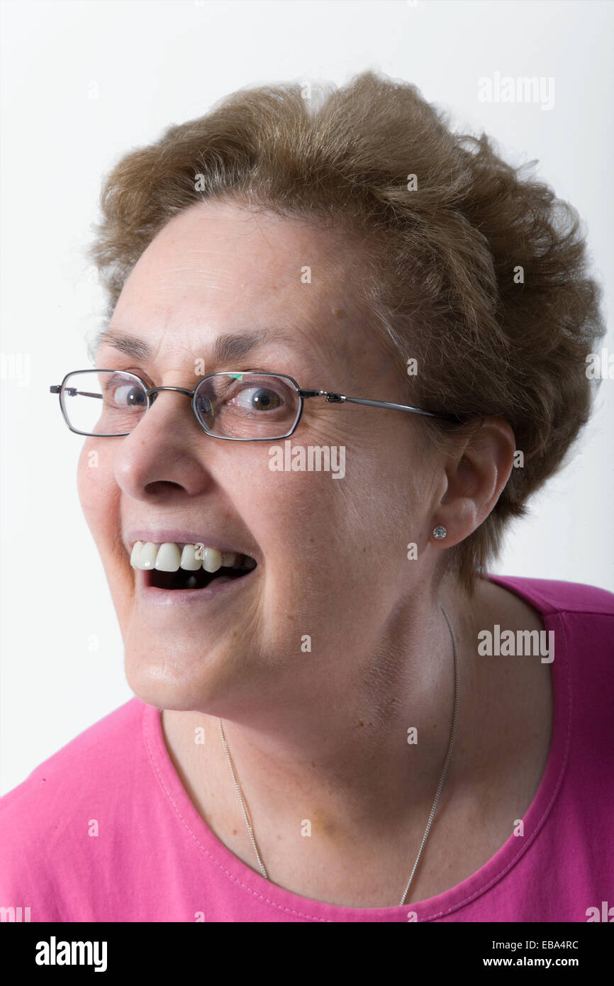 Portrait of an older woman smiling Stock Photo - Alamy