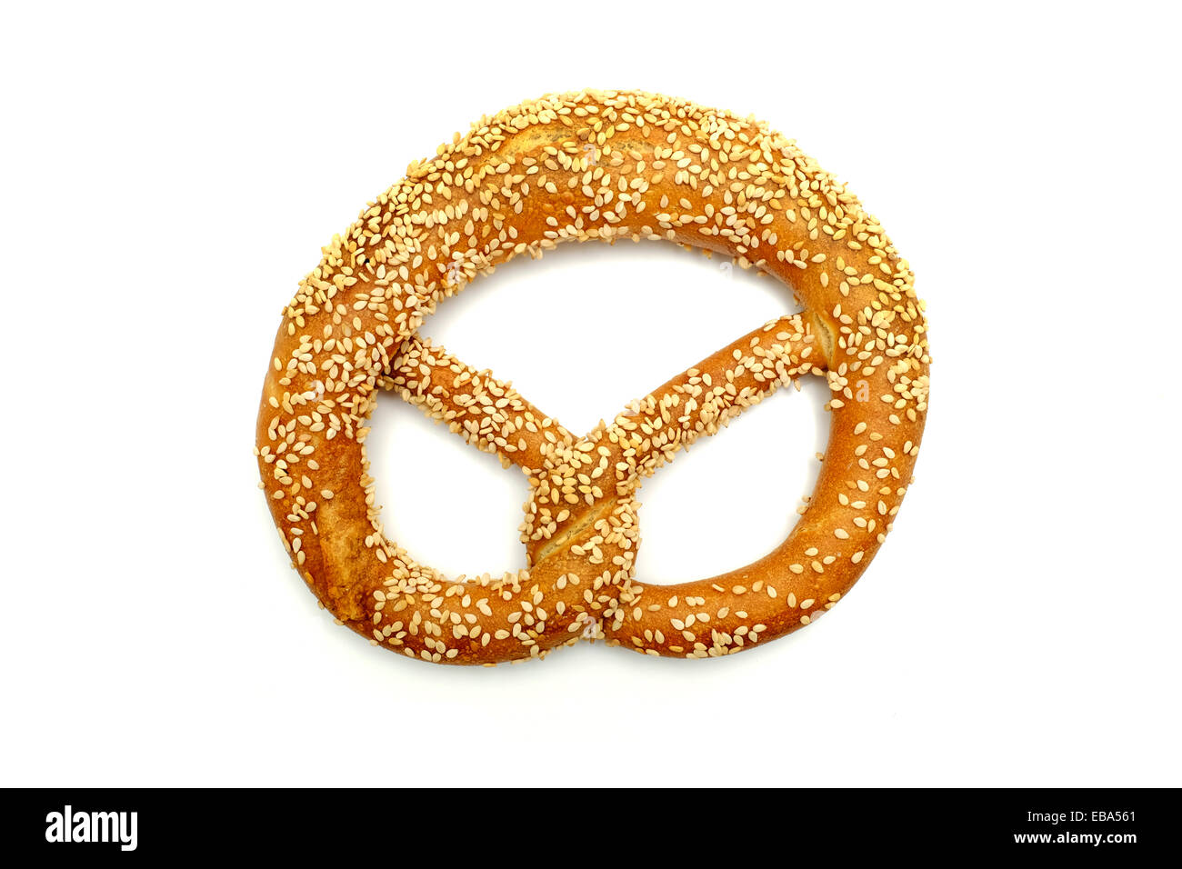 Pretzel with sesame seeds on a white background Stock Photo - Alamy