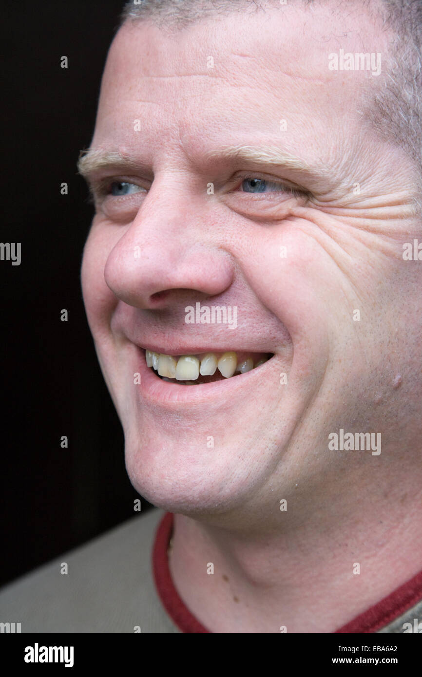 Portrait of a man smiling Stock Photo - Alamy