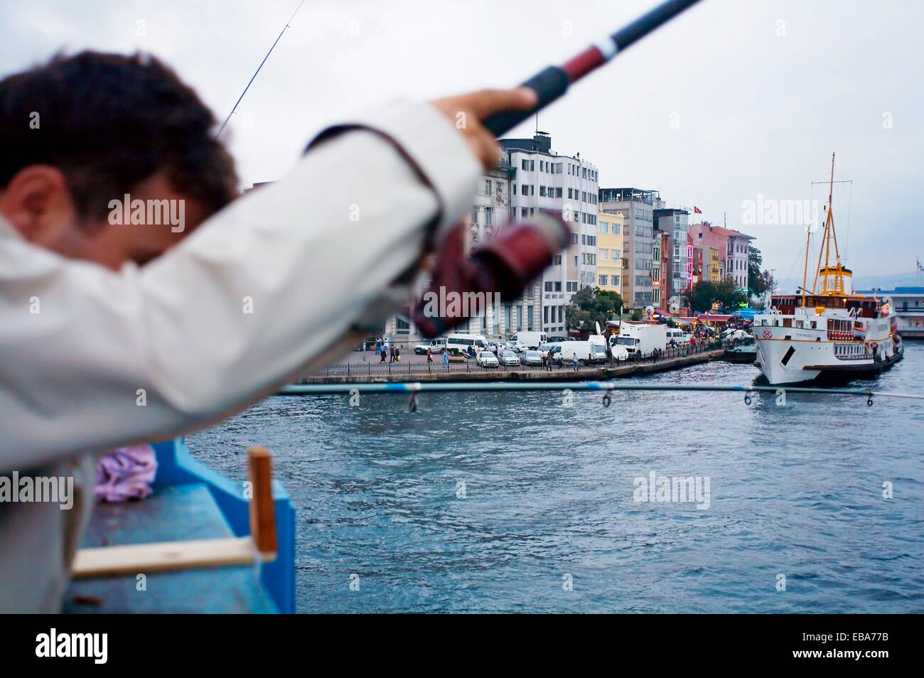 Men fishing on the Galata Bridge Istanbul Turkey Stock Photo - Alamy
