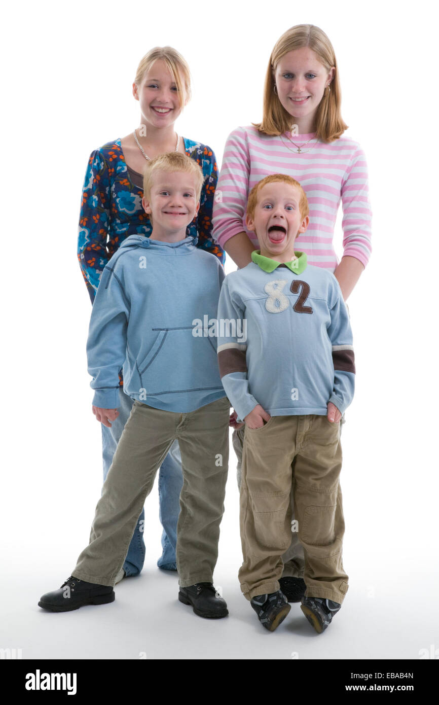 Group of siblings in the studio Stock Photo - Alamy