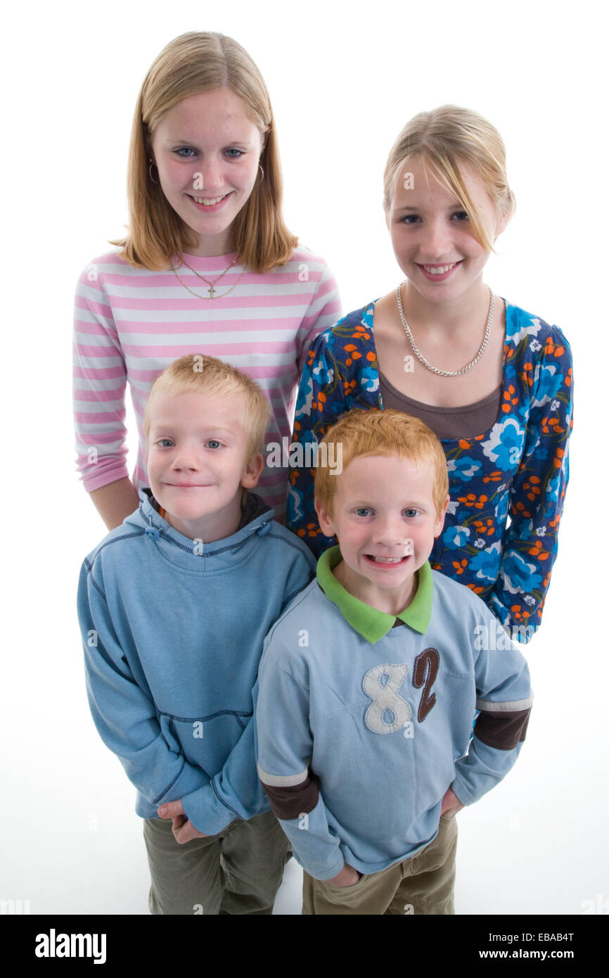 Group of siblings in the studio Stock Photo - Alamy