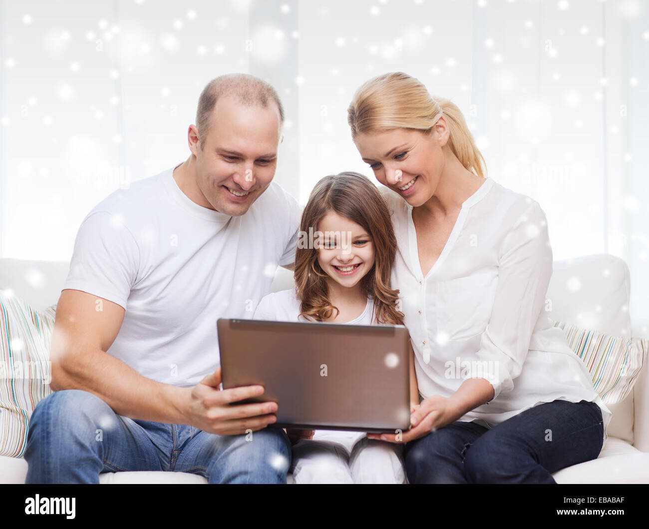 smiling family with laptop at home Stock Photo - Alamy