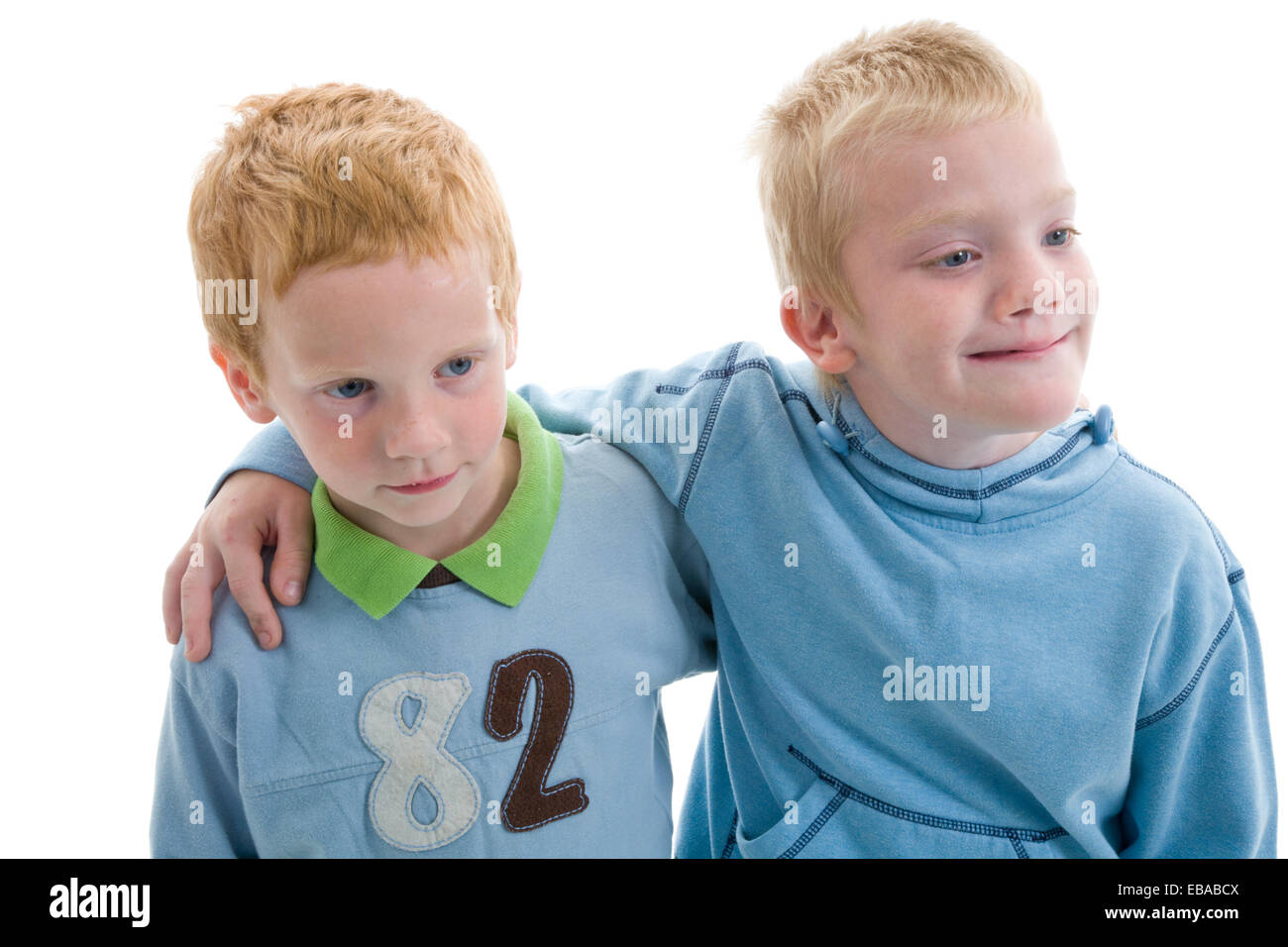 Portrait of two little brothers in the studio Stock Photo - Alamy