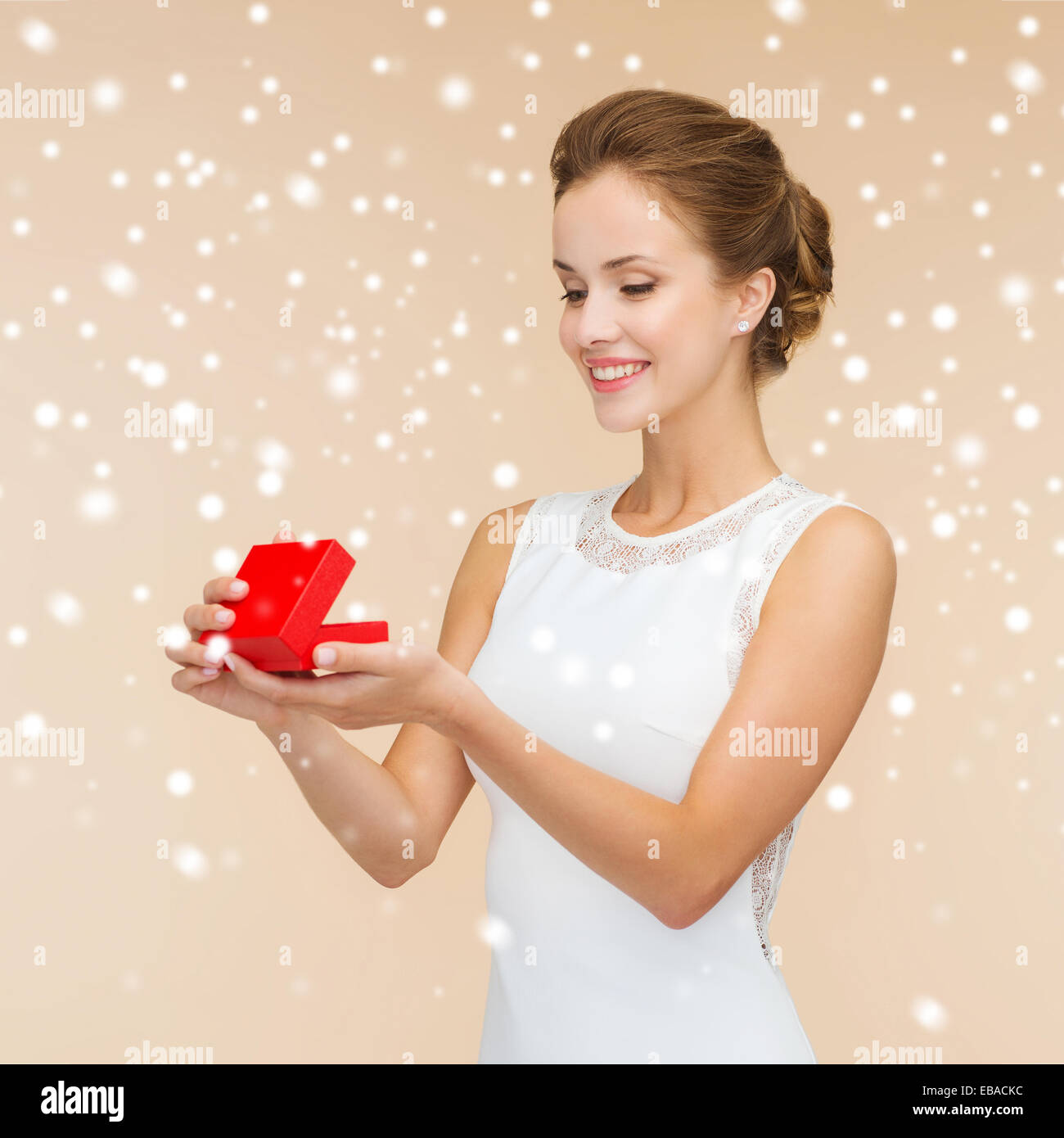 Woman receiving gift box hi-res stock photography and images - Alamy