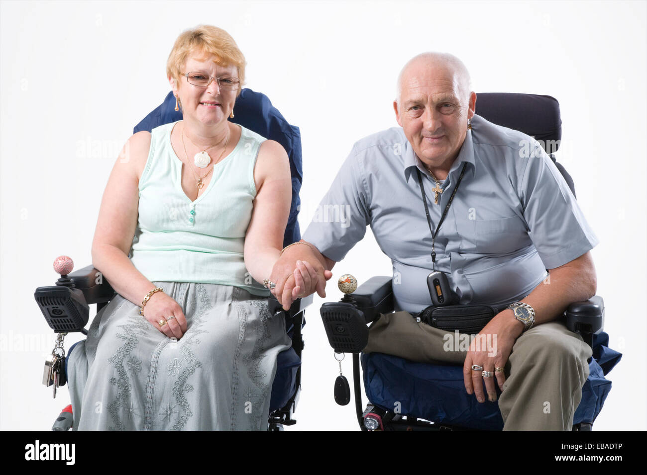 Disabled couple smiling and holding hands with one another Stock Photo ...