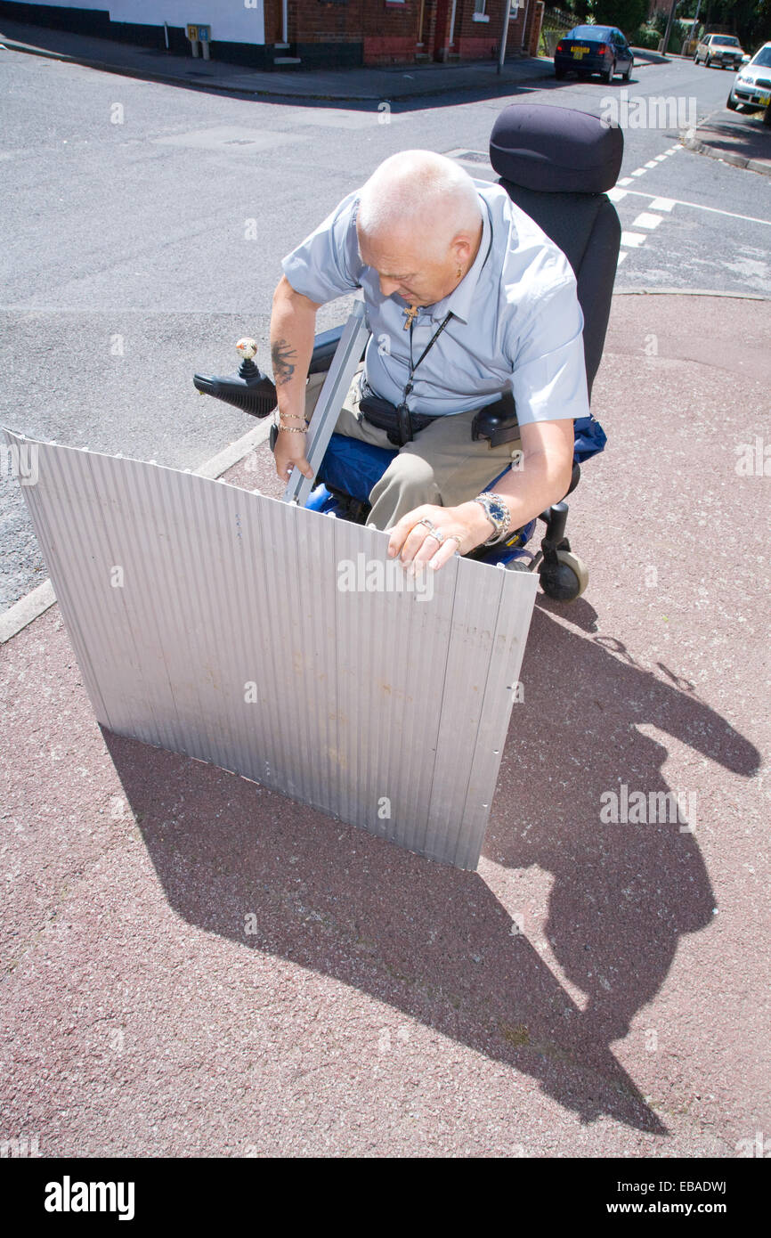 Male wheelchair user setting hi-res stock photography and images - Alamy