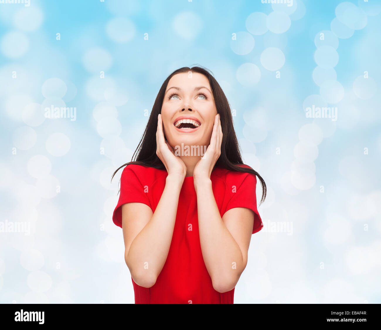 smiling woman in red dress Stock Photo - Alamy