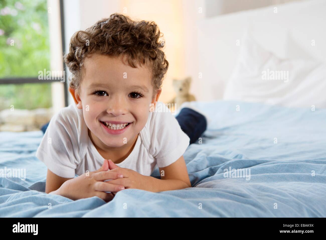 Four year old boy lying hi-res stock photography and images - Alamy