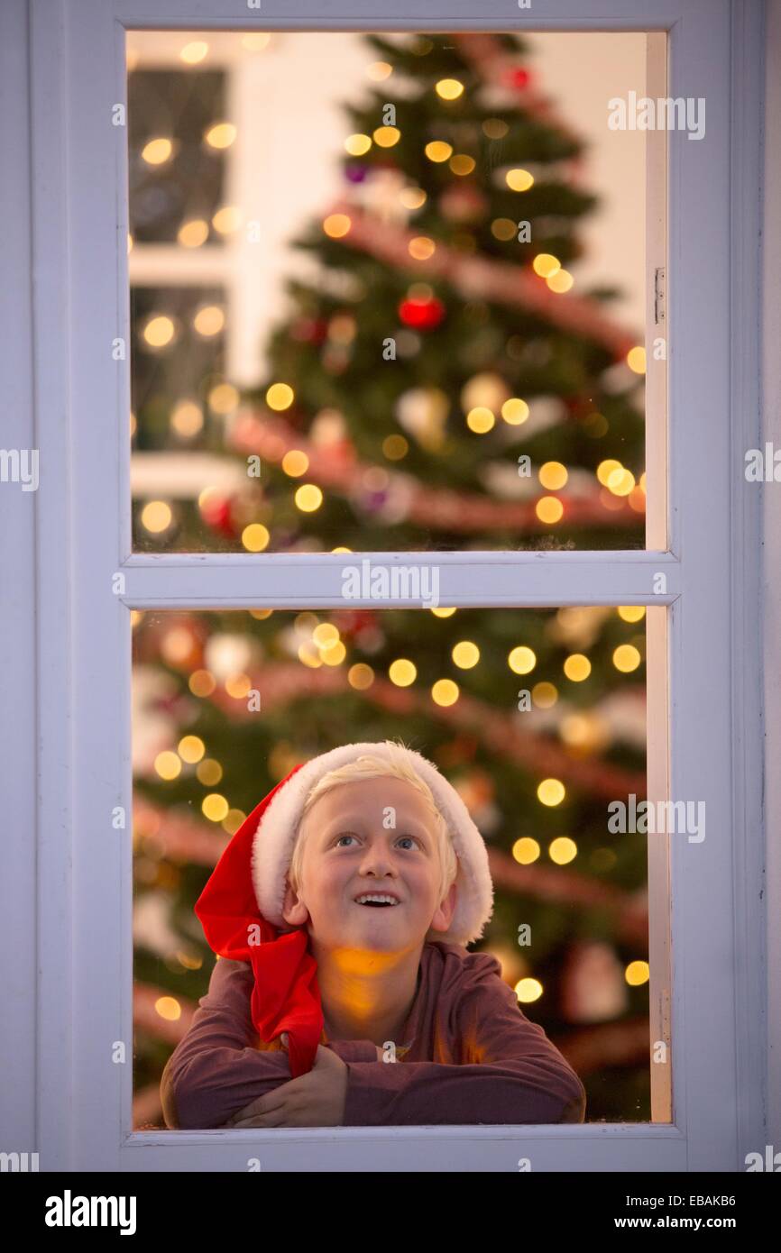 Young boy waiting for santa claus Stock Photo - Alamy
