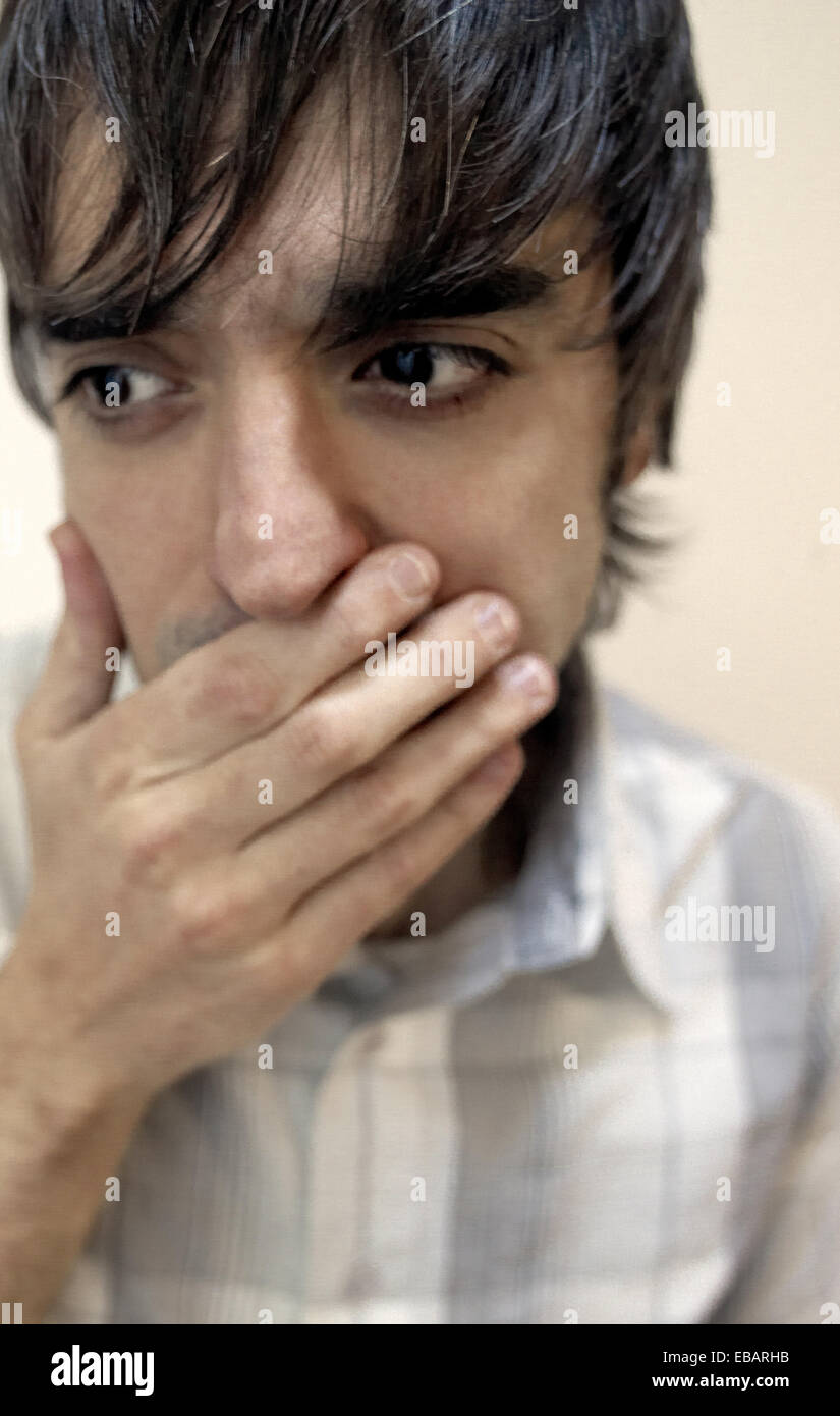Young man thinking Stock Photo - Alamy