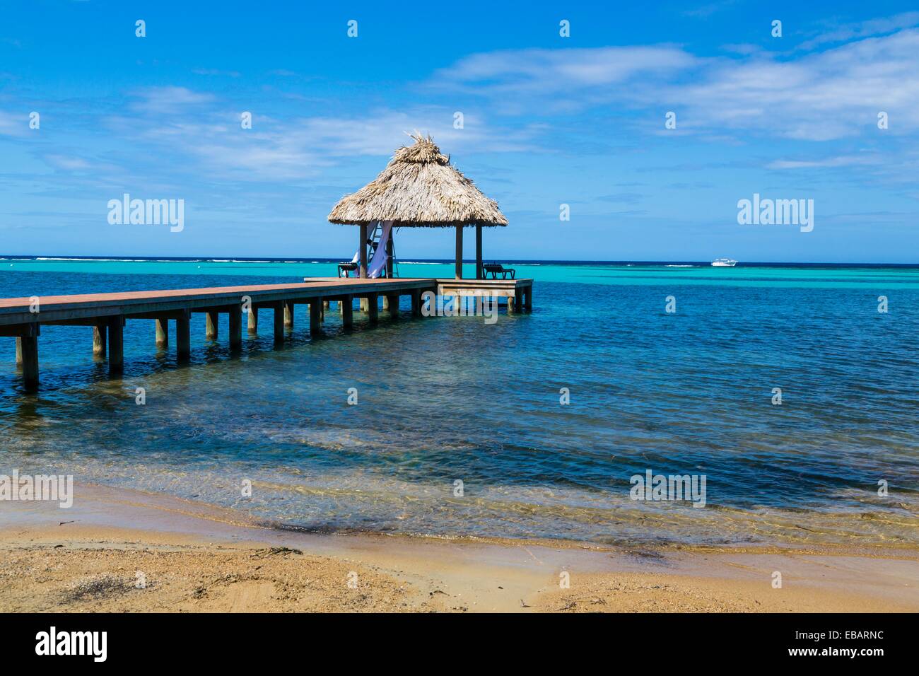 A beach pier near Sandy Bay, Roatan, Honduras Stock Photo - Alamy