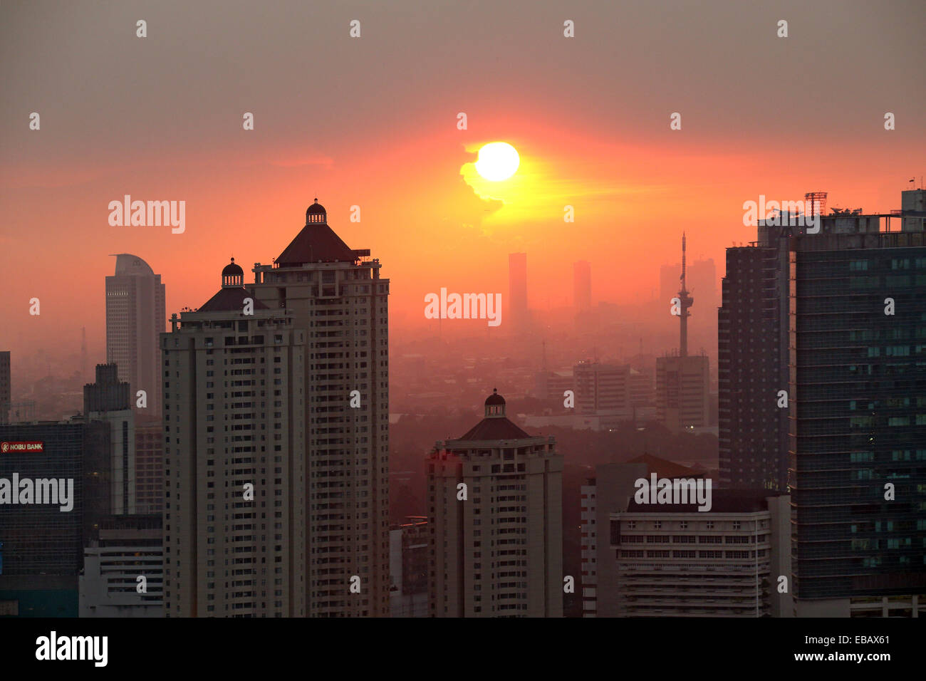 Sunset over Jakarta, Java, Indonesia, Southeast Asia Stock Photo - Alamy