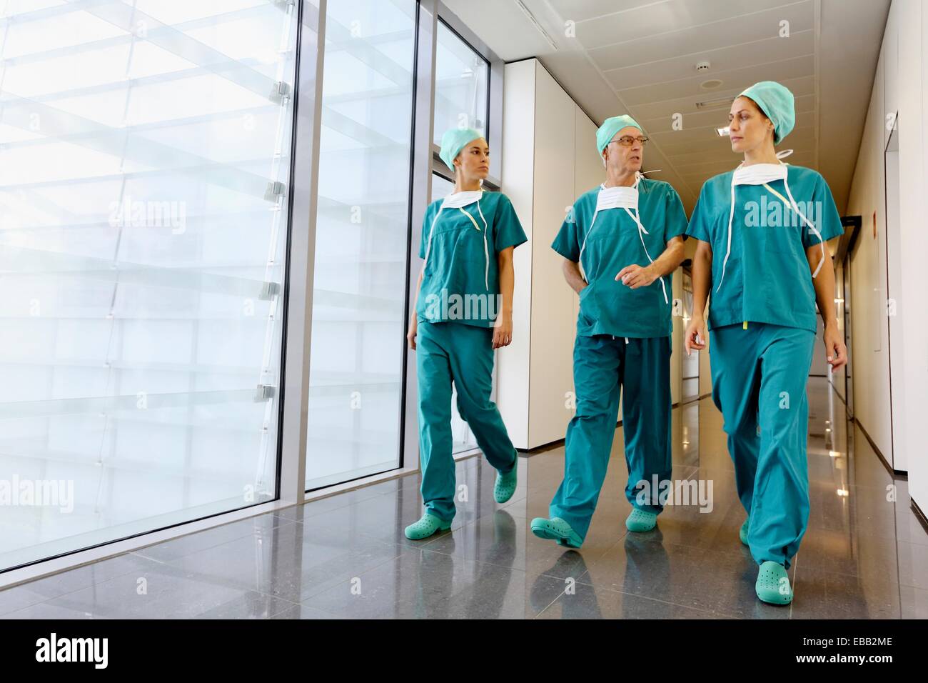 surgeons walking in the operating room hallway, Onkologikoa Hospital ...