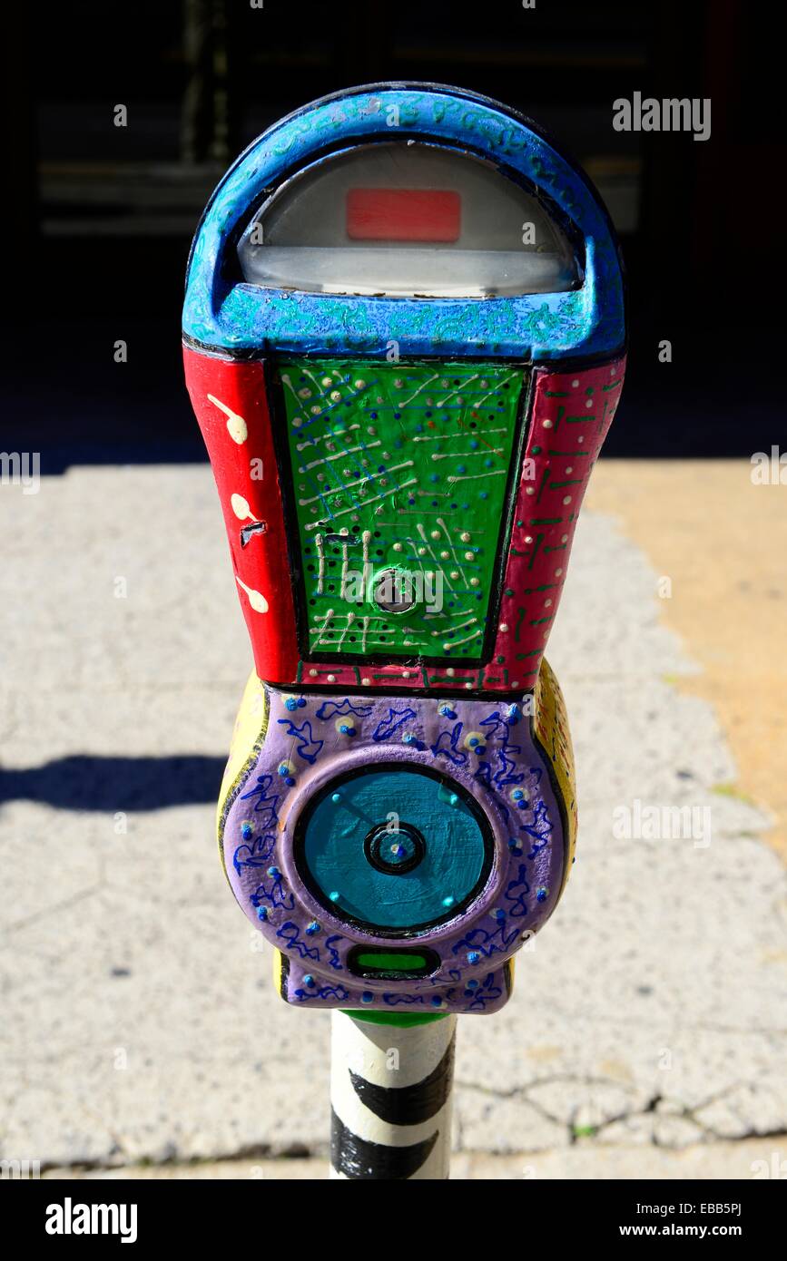 Colorfully decorated parking meter in city parking space Stock Photo ...