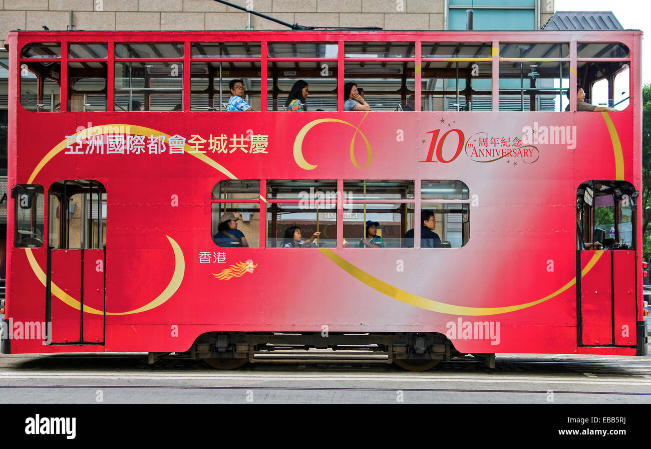 Hong Kong, advertising decorations on the typical double-deck tram ...