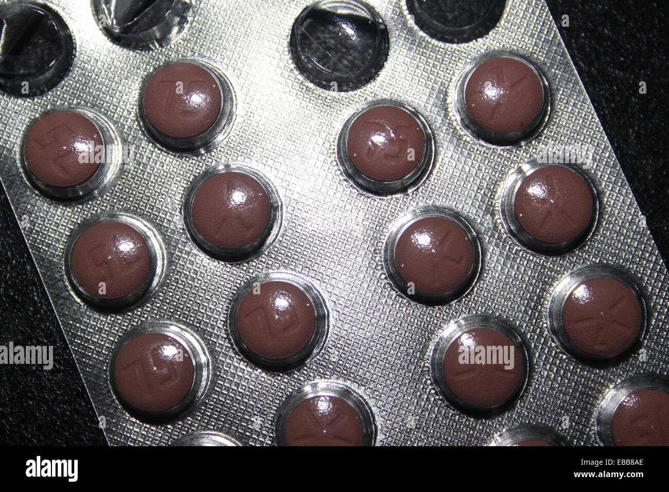 pills in silver packaging Stock Photo - Alamy