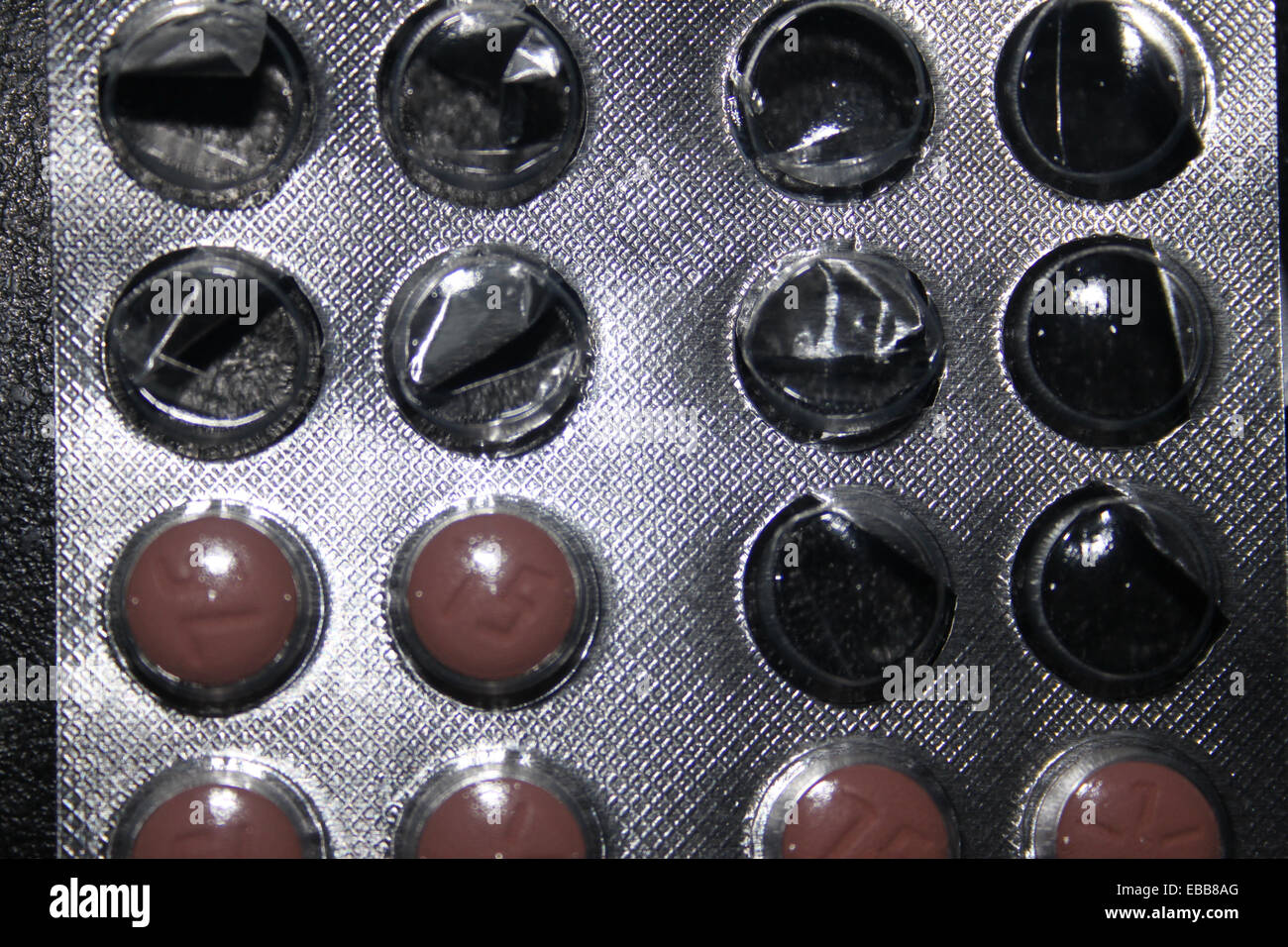 pills in silver packaging Stock Photo - Alamy