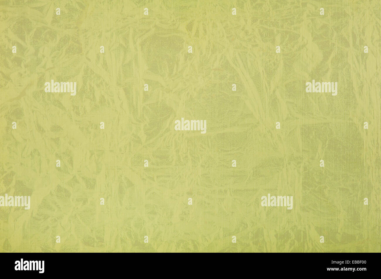 Yellow green ragged cardboard texture Stock Photo - Alamy