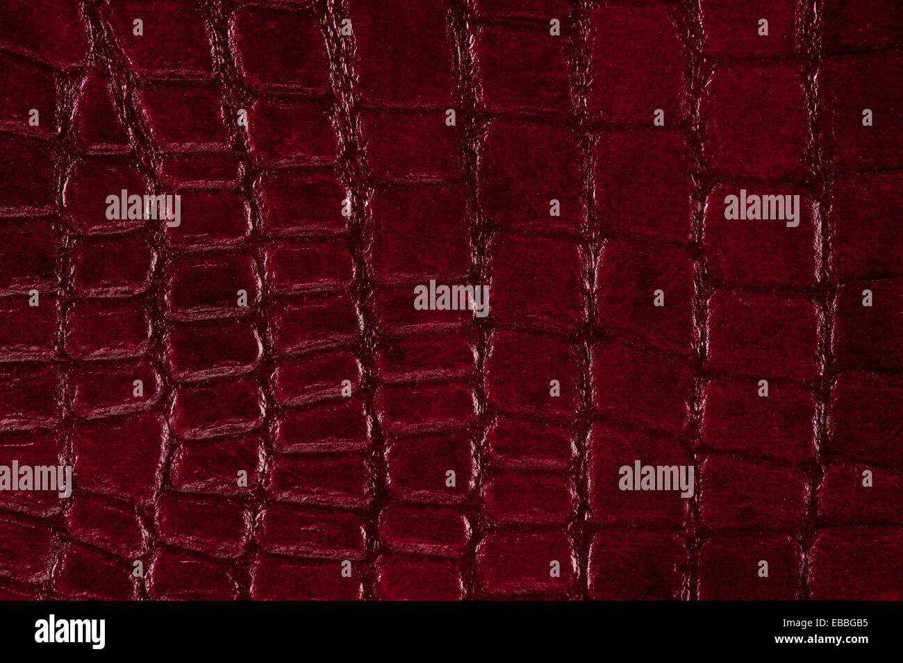 Maroon snake leather cloth imitation Stock Photo - Alamy