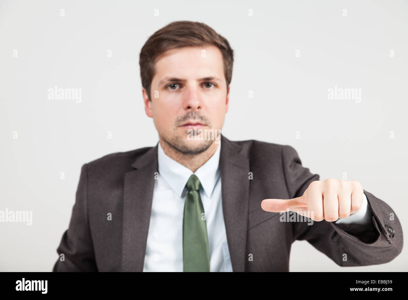 hands of businessman with thump in middle Stock Photo - Alamy
