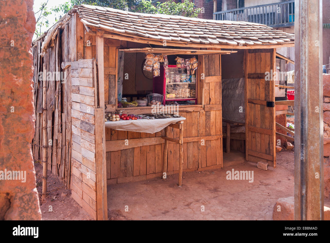 Wooden shack grocery shop in a suburban street in Antananarivo, or Tana ...