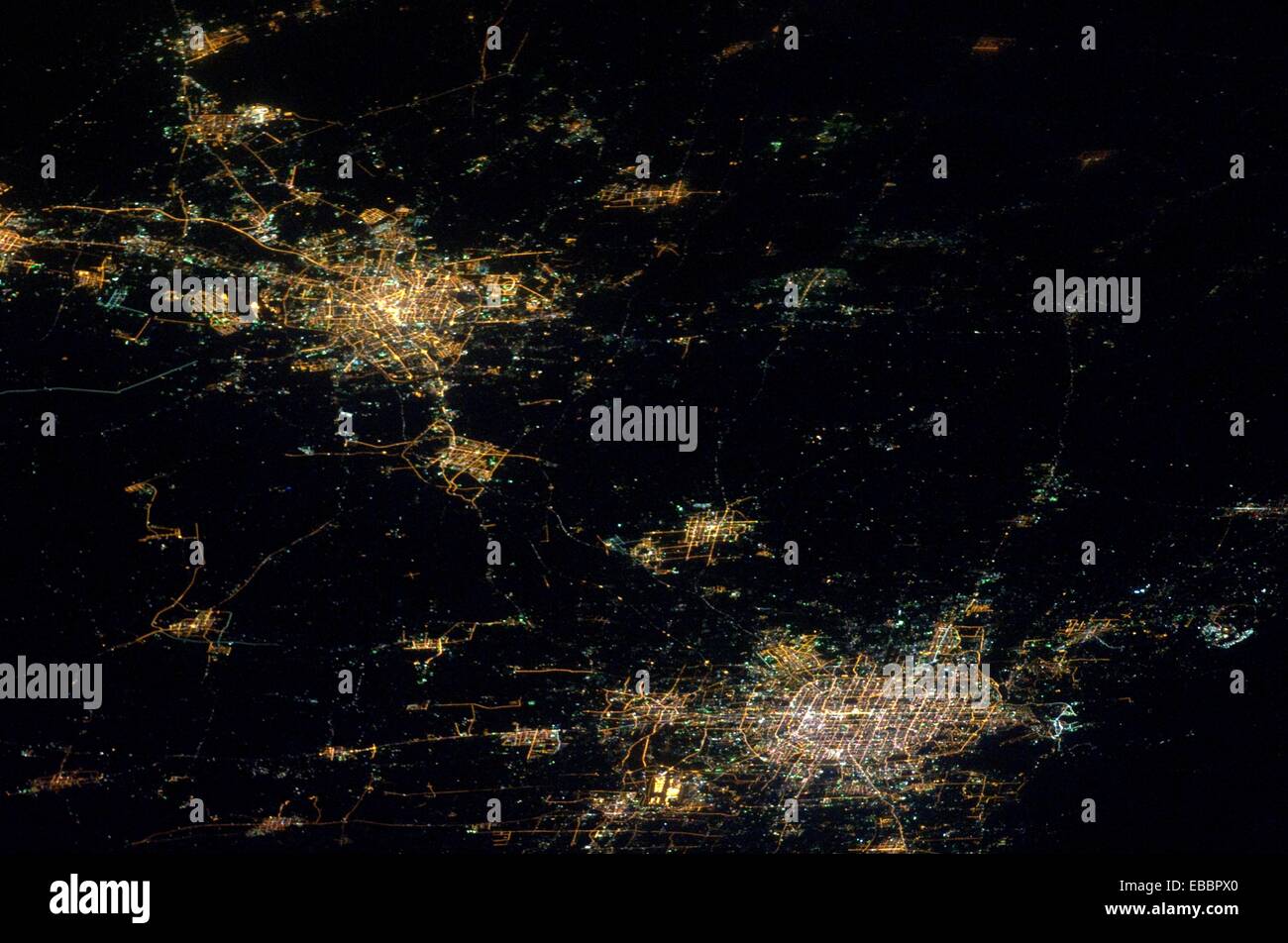 City Lights This striking photograph features two of China’s most ...