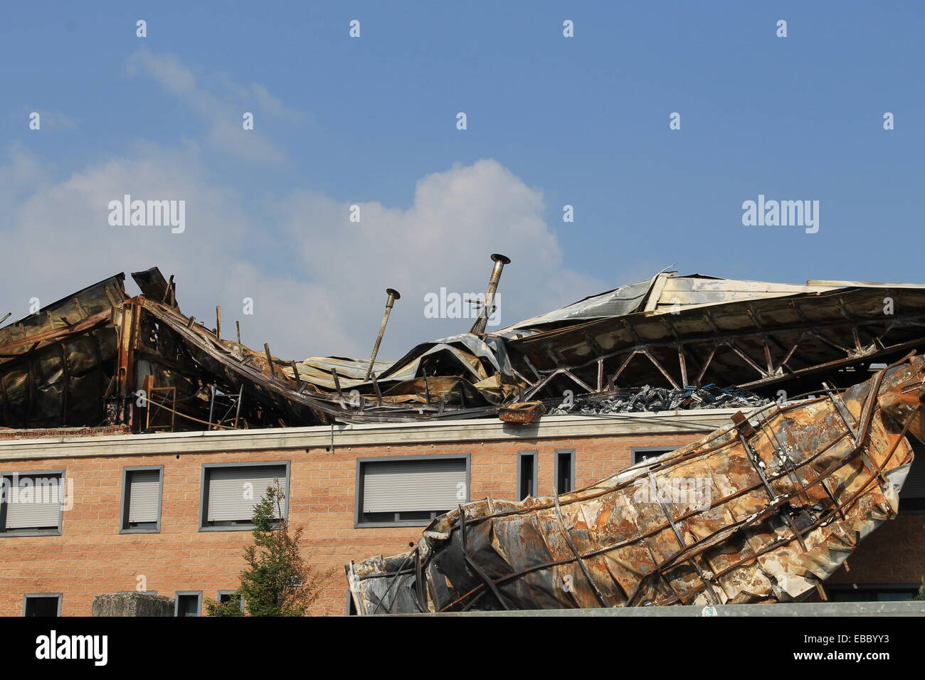 outdoor industrial warehouse destroyed by fire Stock Photo - Alamy