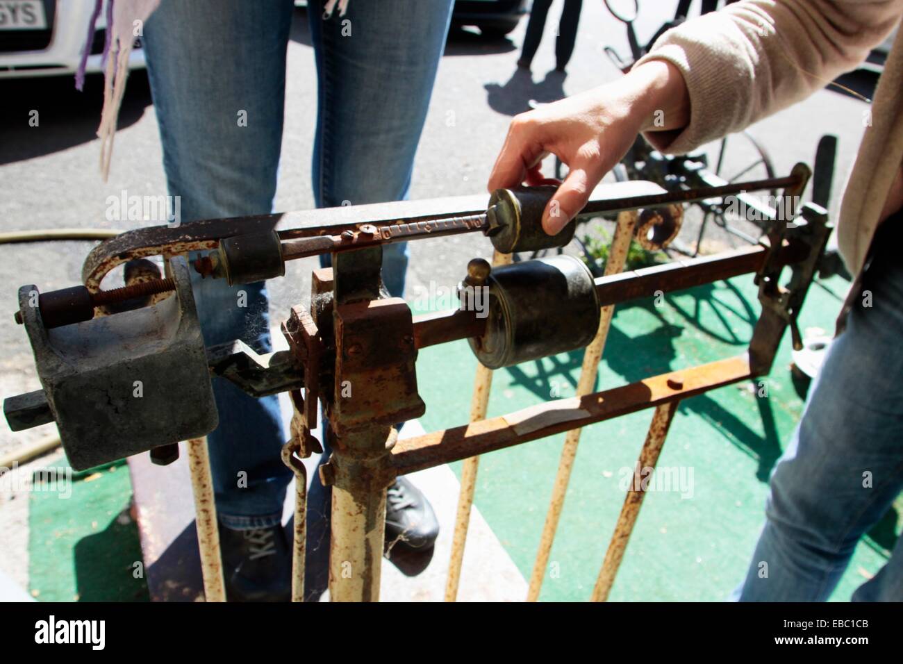 A girl swings weighed on a Roman Stock Photo - Alamy