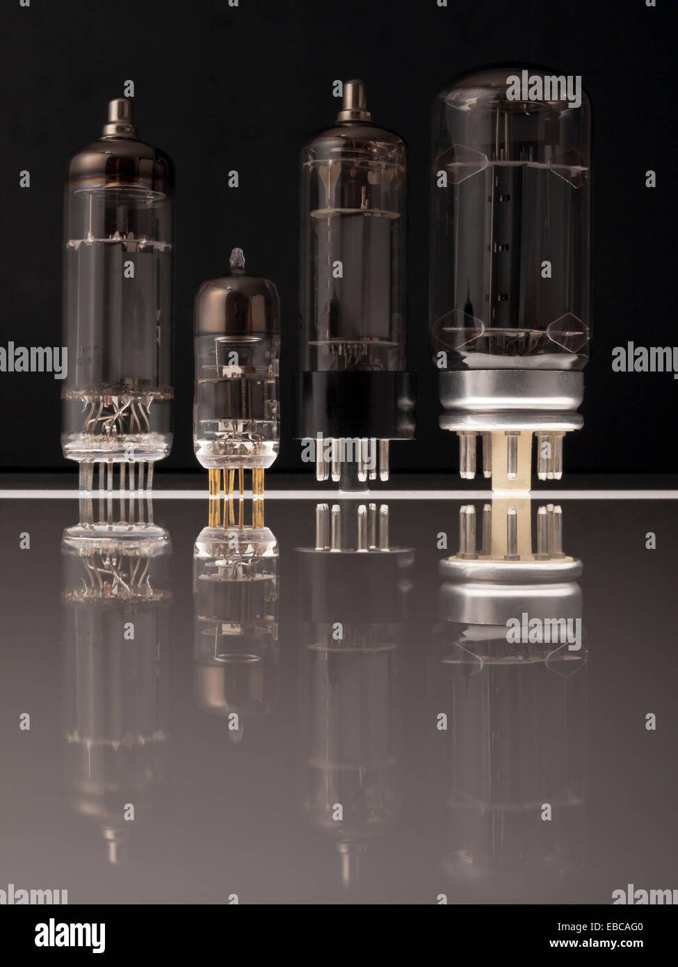 Vacuum tubes on black background with reflection Stock Photo - Alamy