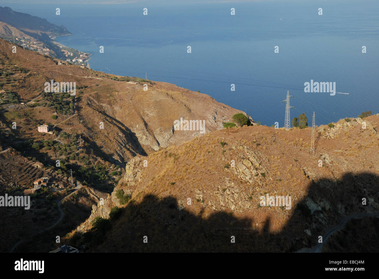 Hills and the coast seen from high above Taormina, Sicily, Italy Stock ...