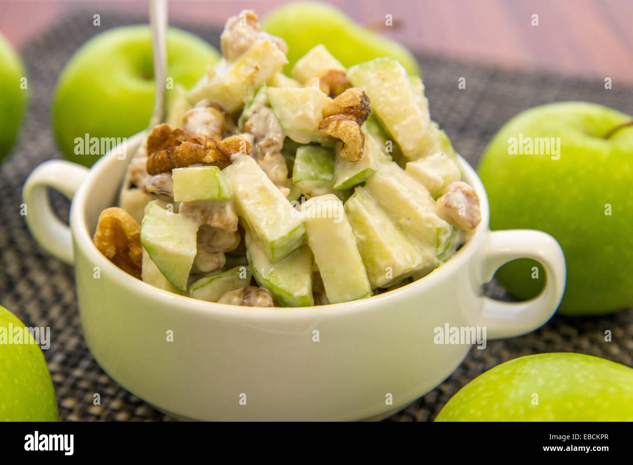 green apple and walnut salad with condensed milk Stock Photo - Alamy