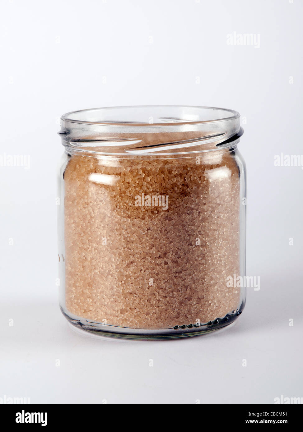 Jar with brown sugar Stock Photo - Alamy