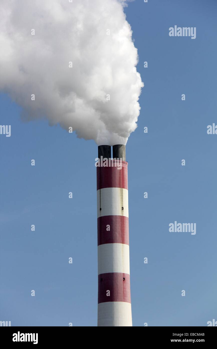 Power plant chimney smoking inside Stock Photo - Alamy